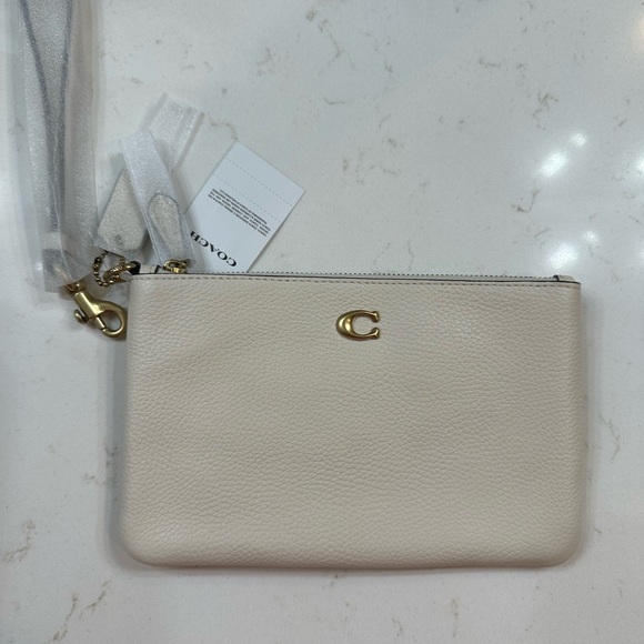 Coach | Bags | Coach Ivory Leather Wristlet | Poshmark